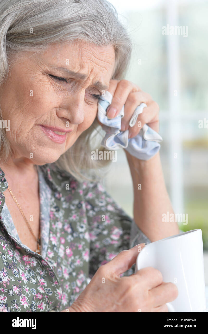 Elderly woman crying man hi-res stock photography and images - Alamy