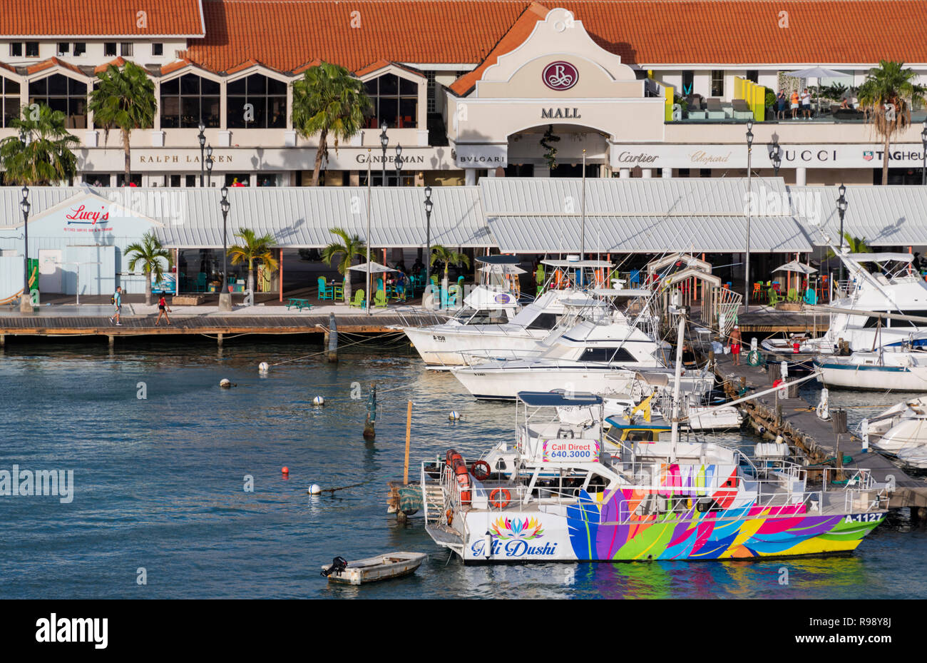 Views of Renaissance Marina Aruba with colourful yachts and designer ...