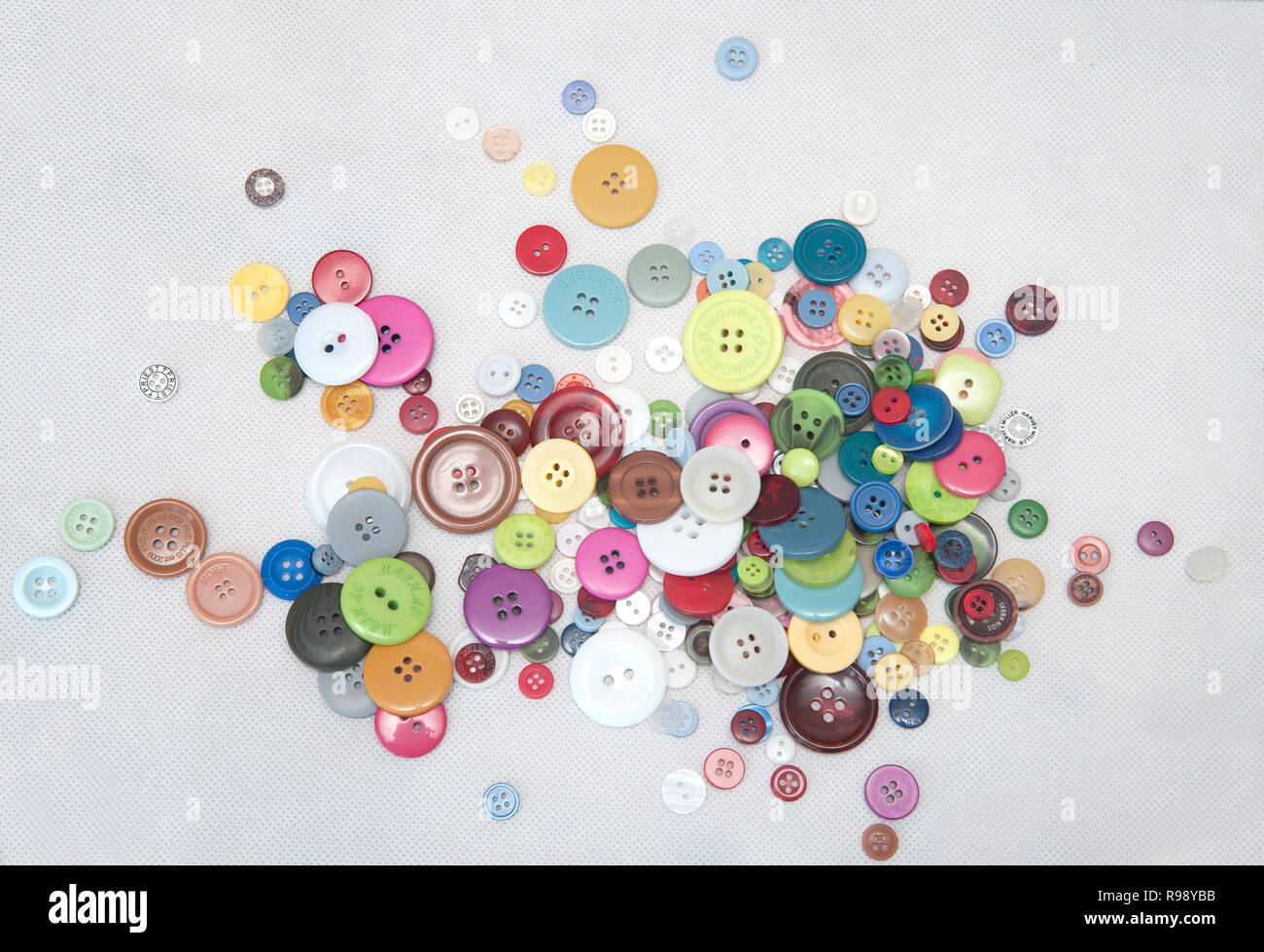 multi-coloured collection of buttons on white background Stock Photo ...