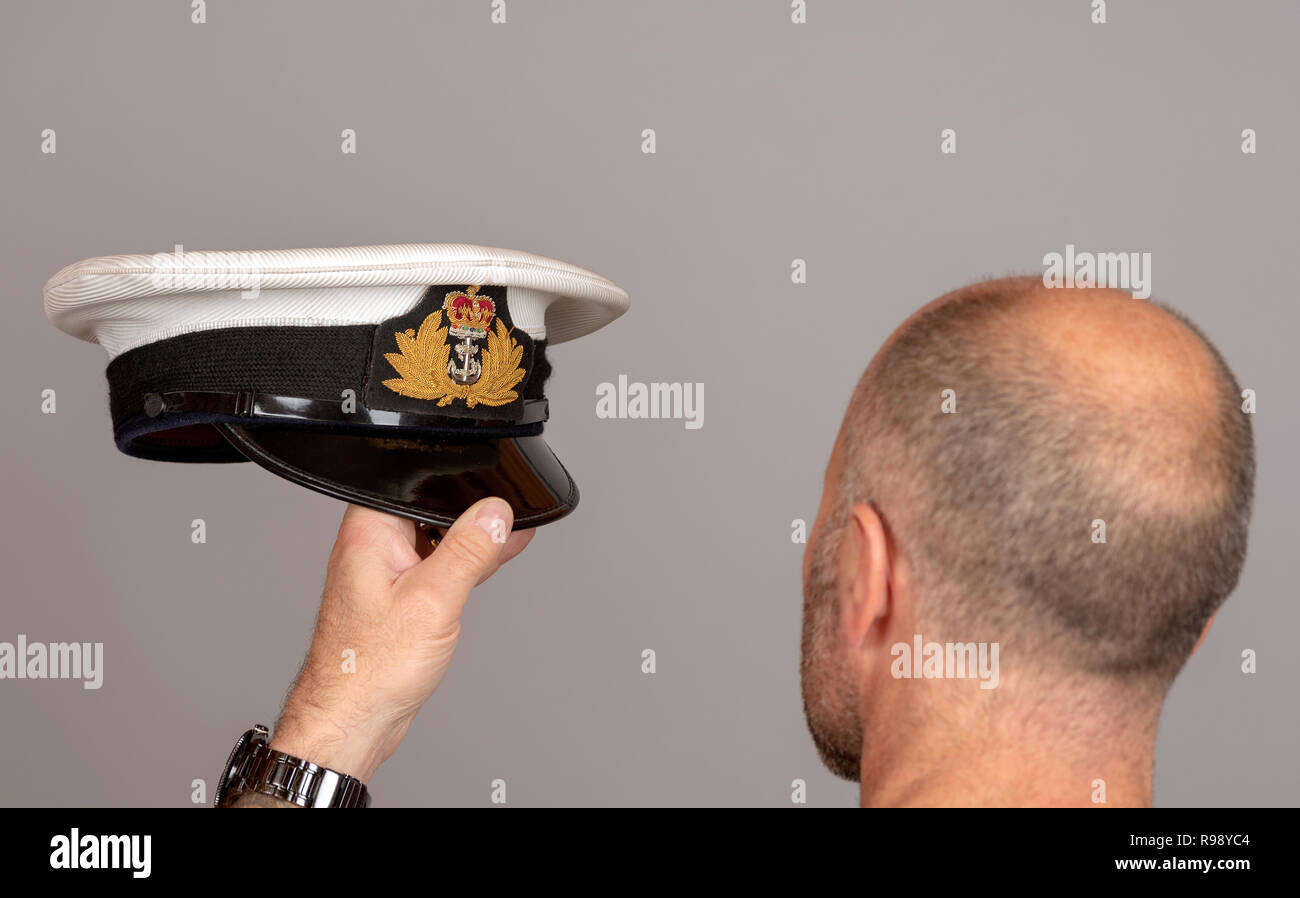 Naval officer with short hair and military uniform cap Stock Photo - Alamy