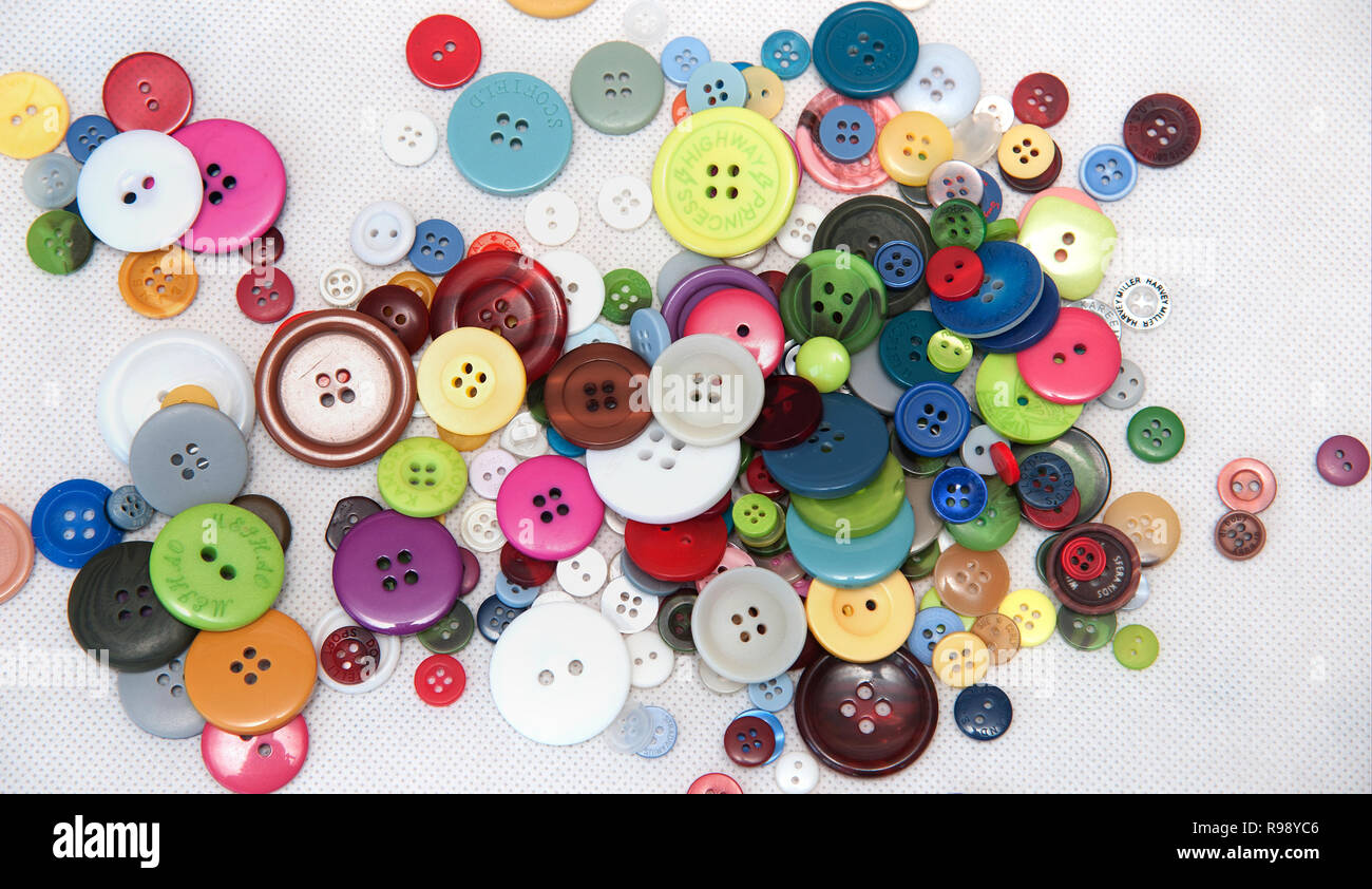 multi-coloured collection of buttons on white background Stock Photo ...