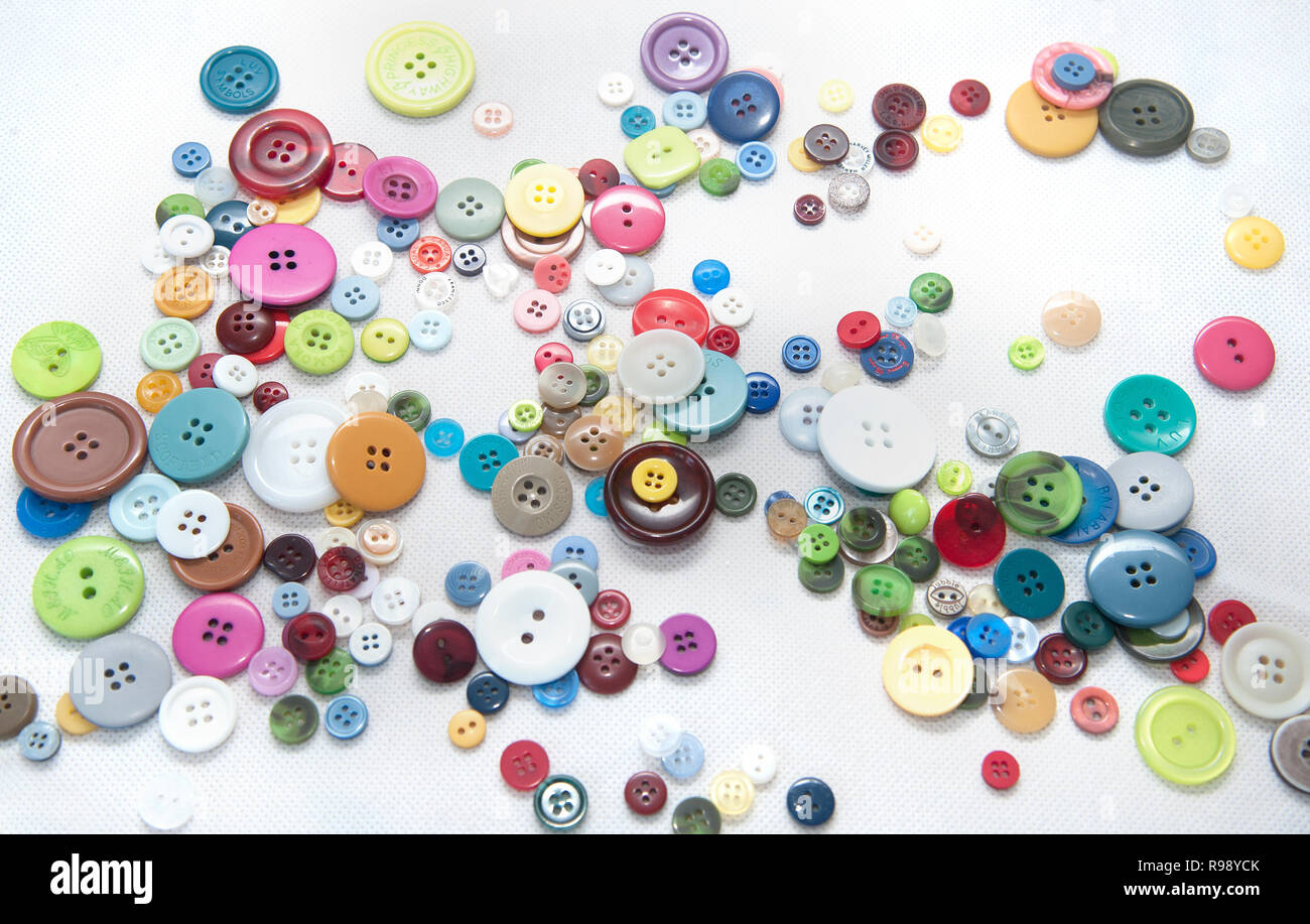 multi-coloured collection of buttons on white background Stock Photo ...