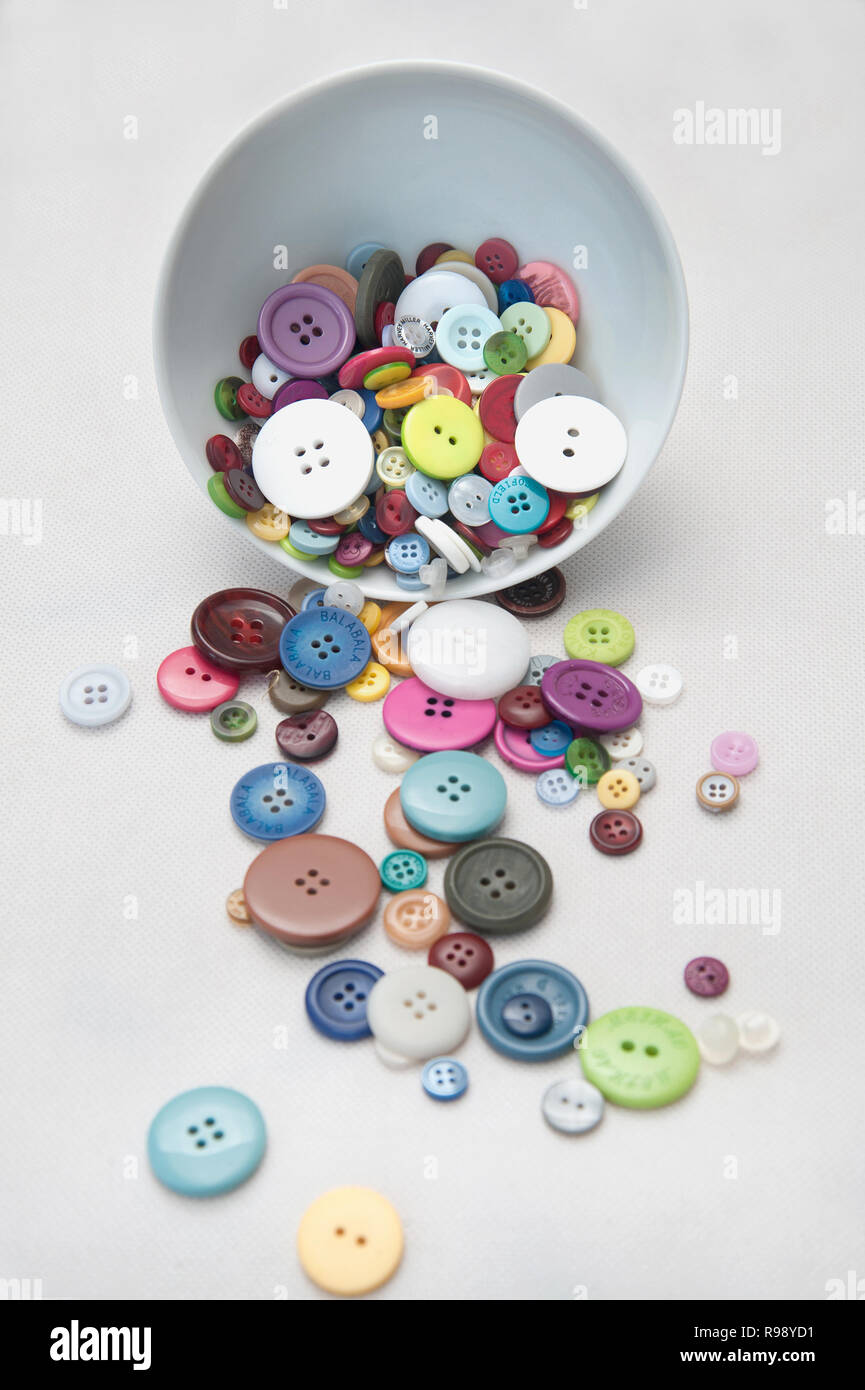 multi-coloured collection of buttons on white background Stock Photo ...