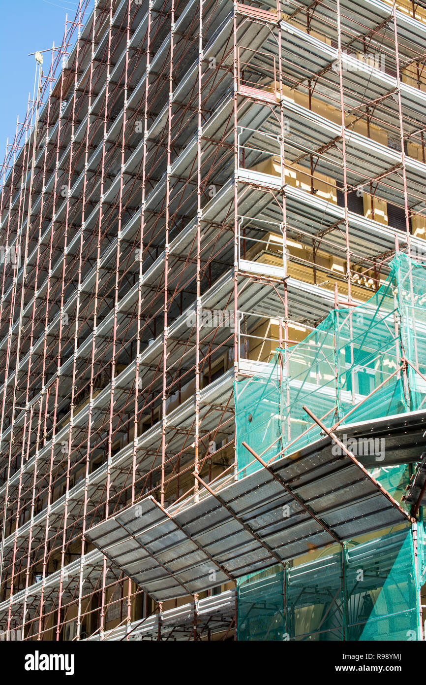 The old building with the scaffolding in Rome, Italy. Concept of safety ...