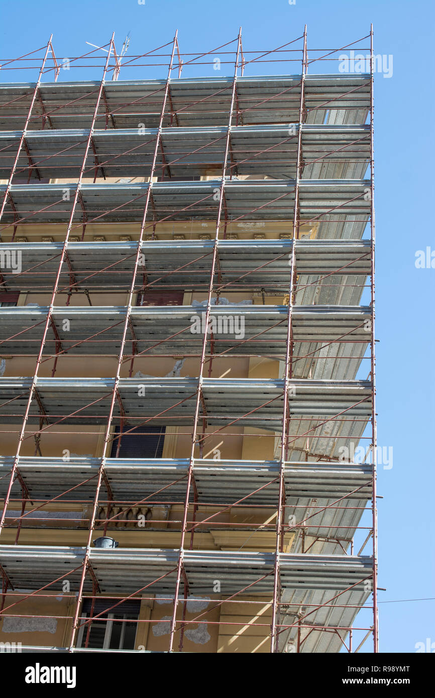 The old building with the scaffolding in Rome, Italy. Concept of safety ...