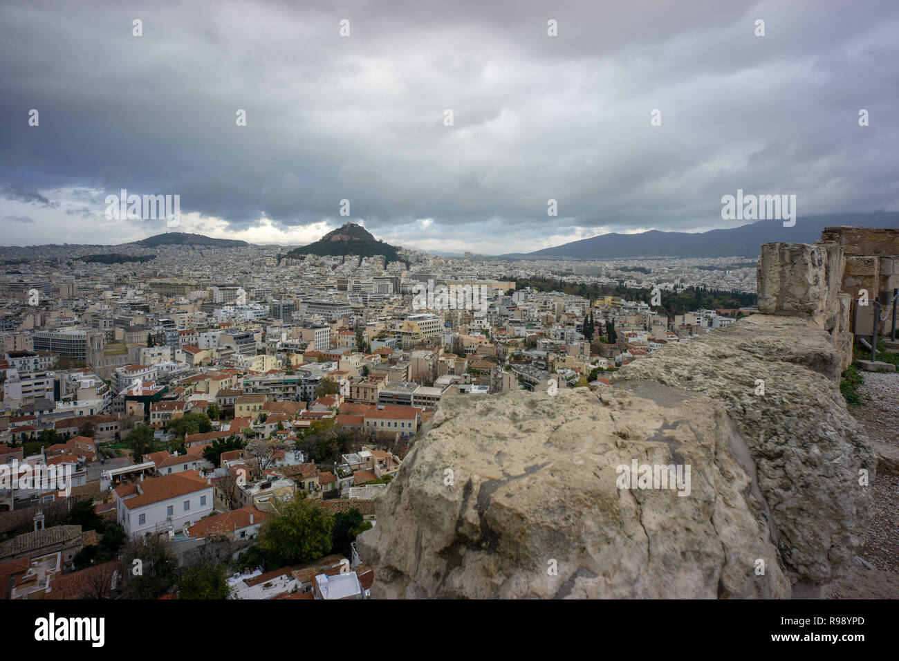 The city of Athens seen from Atop of Acropolis accompanied by a cloudy ...