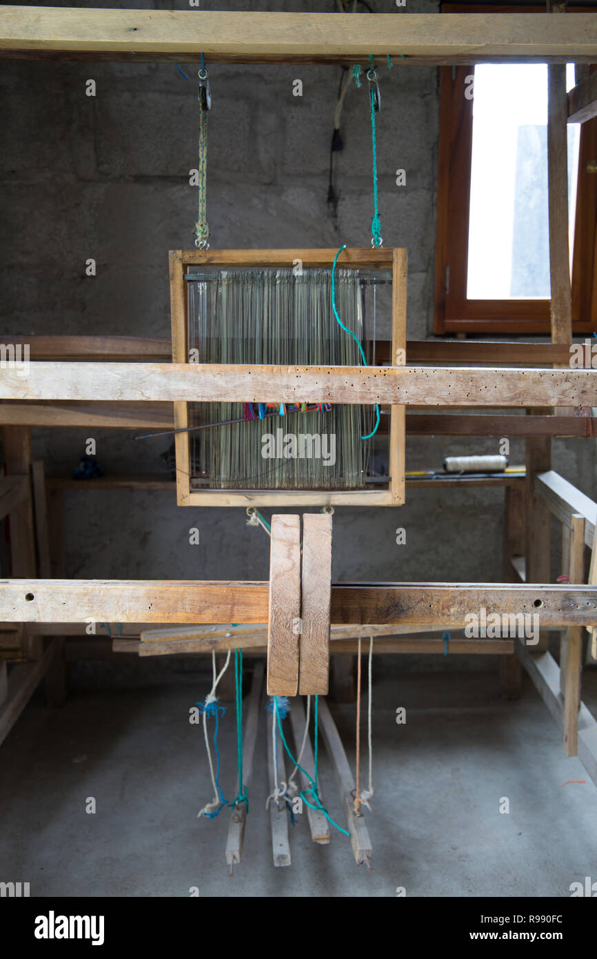 Brightly coloured threads on wooden hand loom, Ecuador, 2018 Stock ...