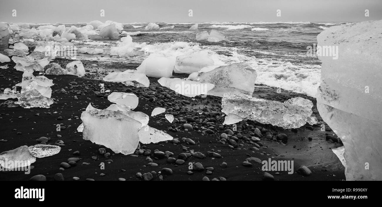 Giant ice blocks detached from icebergs on the coast of an Icelandic ...