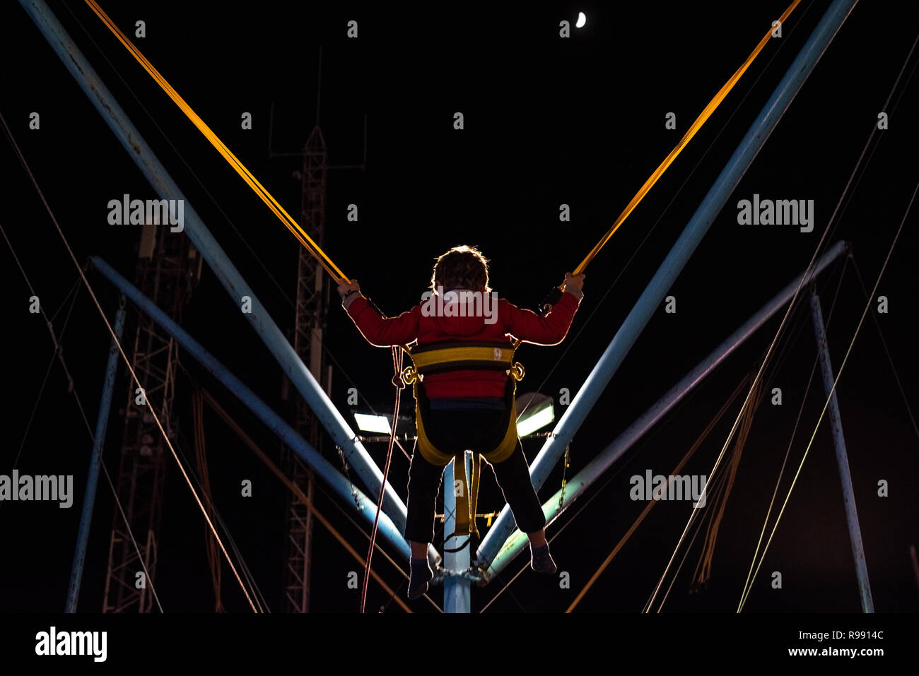 Happy boy bungee jumping hi-res stock photography and images - Alamy