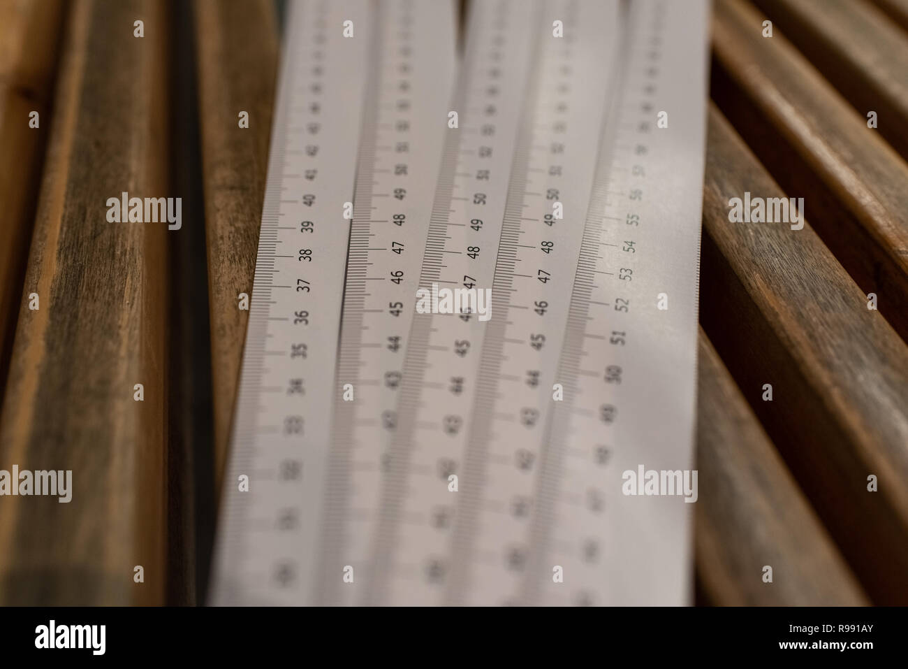 Strips of paper to measure metric distances Stock Photo - Alamy