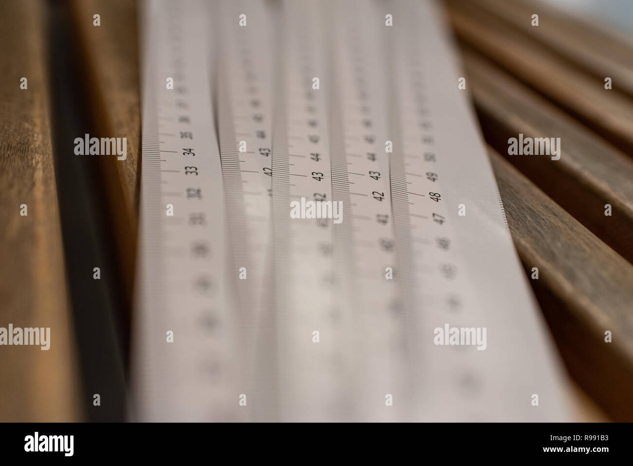 Strips of paper to measure metric distances Stock Photo - Alamy