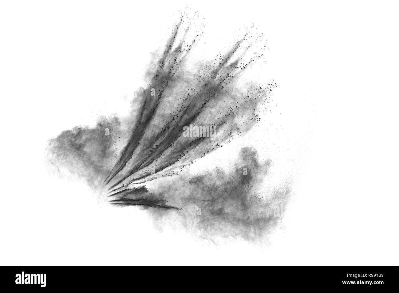 Black particles splattered on white background. Black powder dust ...