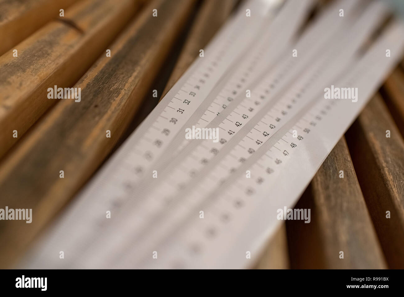 Strips of paper to measure metric distances Stock Photo - Alamy
