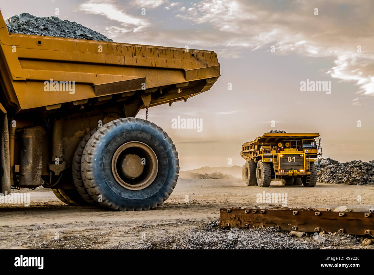Dump Trucks transporting Platinum ore for processing Stock Photo - Alamy