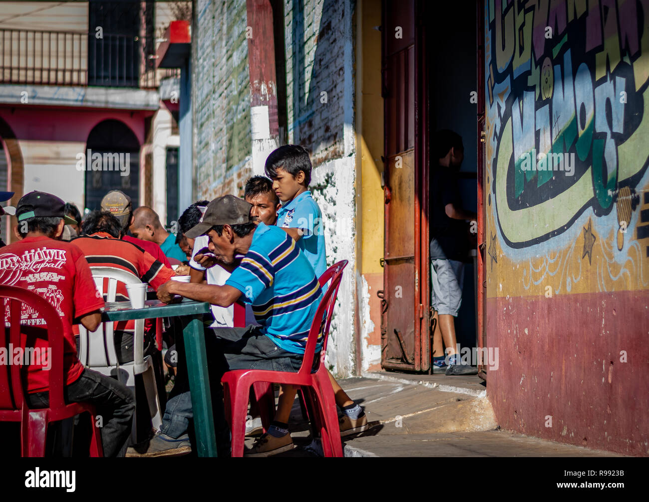 Guatemalan children helping the homeless Stock Photo - Alamy