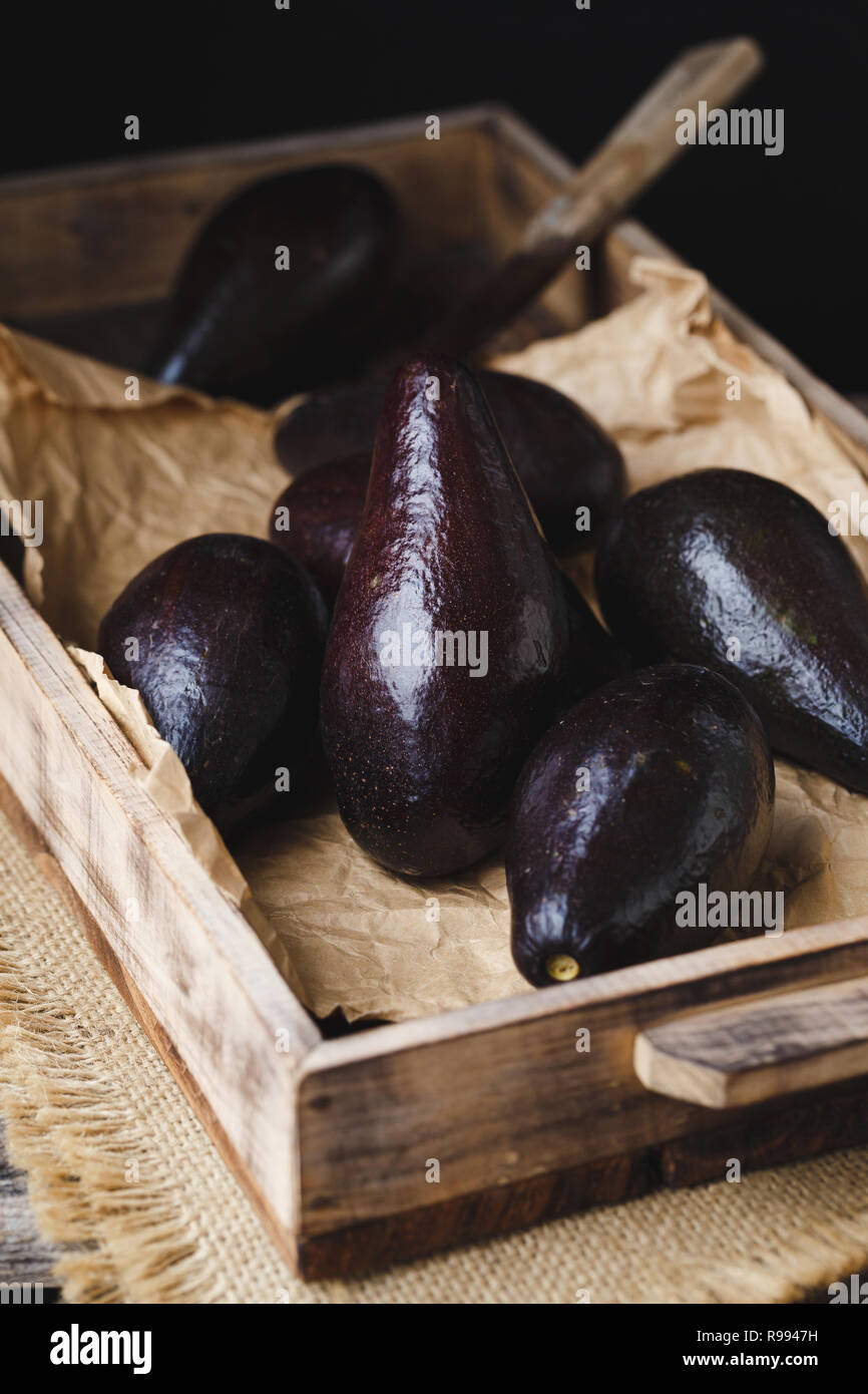 Fresh purple avocado fruits Stock Photo - Alamy