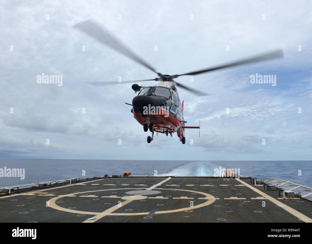 The crew of the Coast Guard Cutter Munro (WMSL 755) conducts air ...