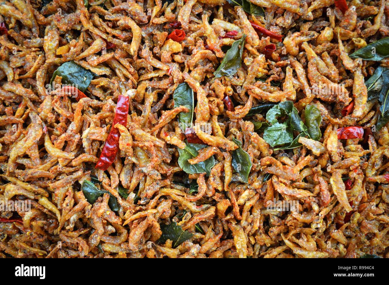 Small Fried Fish Crispy with dried chilli and Kaffir lime leaf / Pile ...