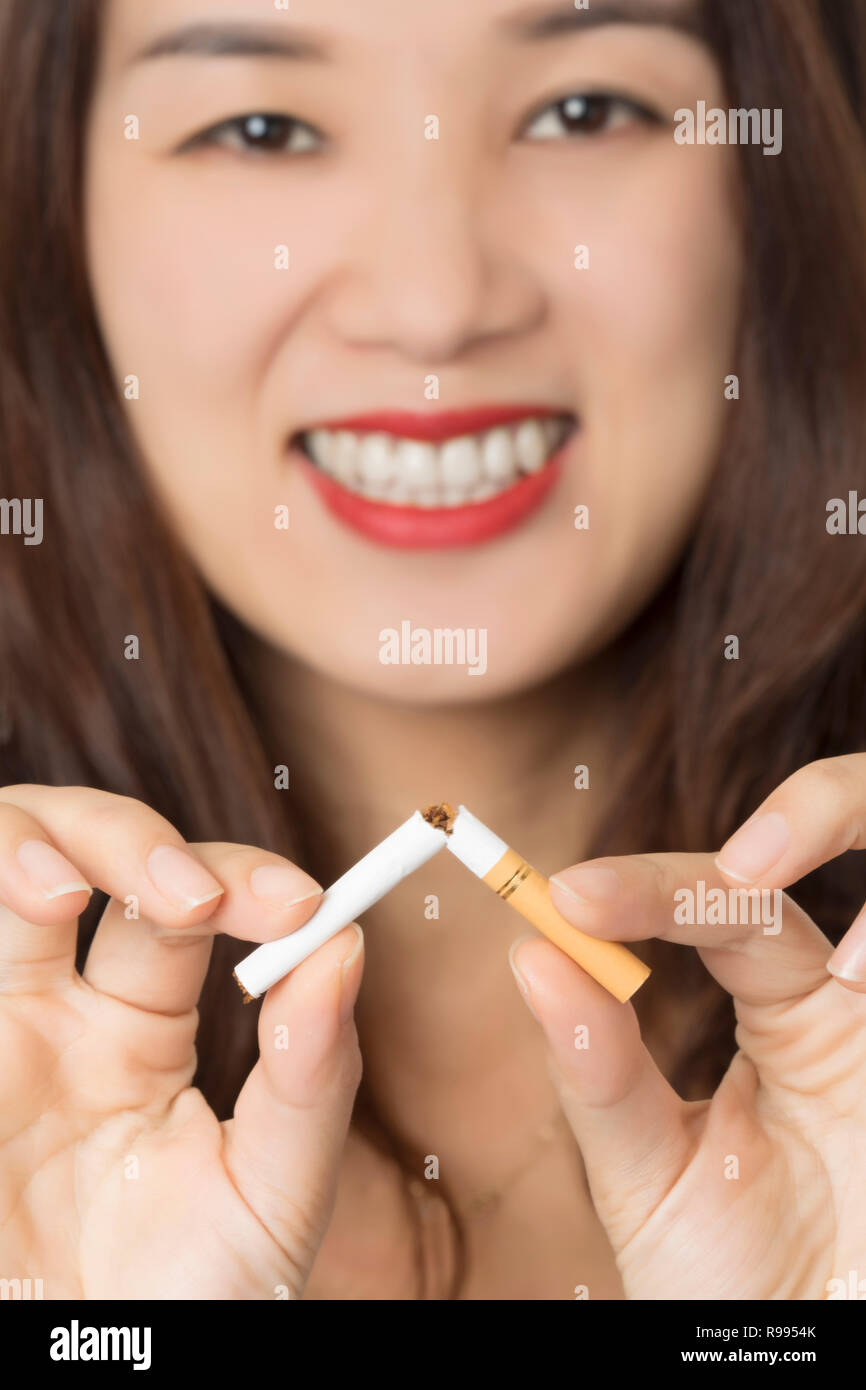 Young asian female woman smoking hi-res stock photography and images ...