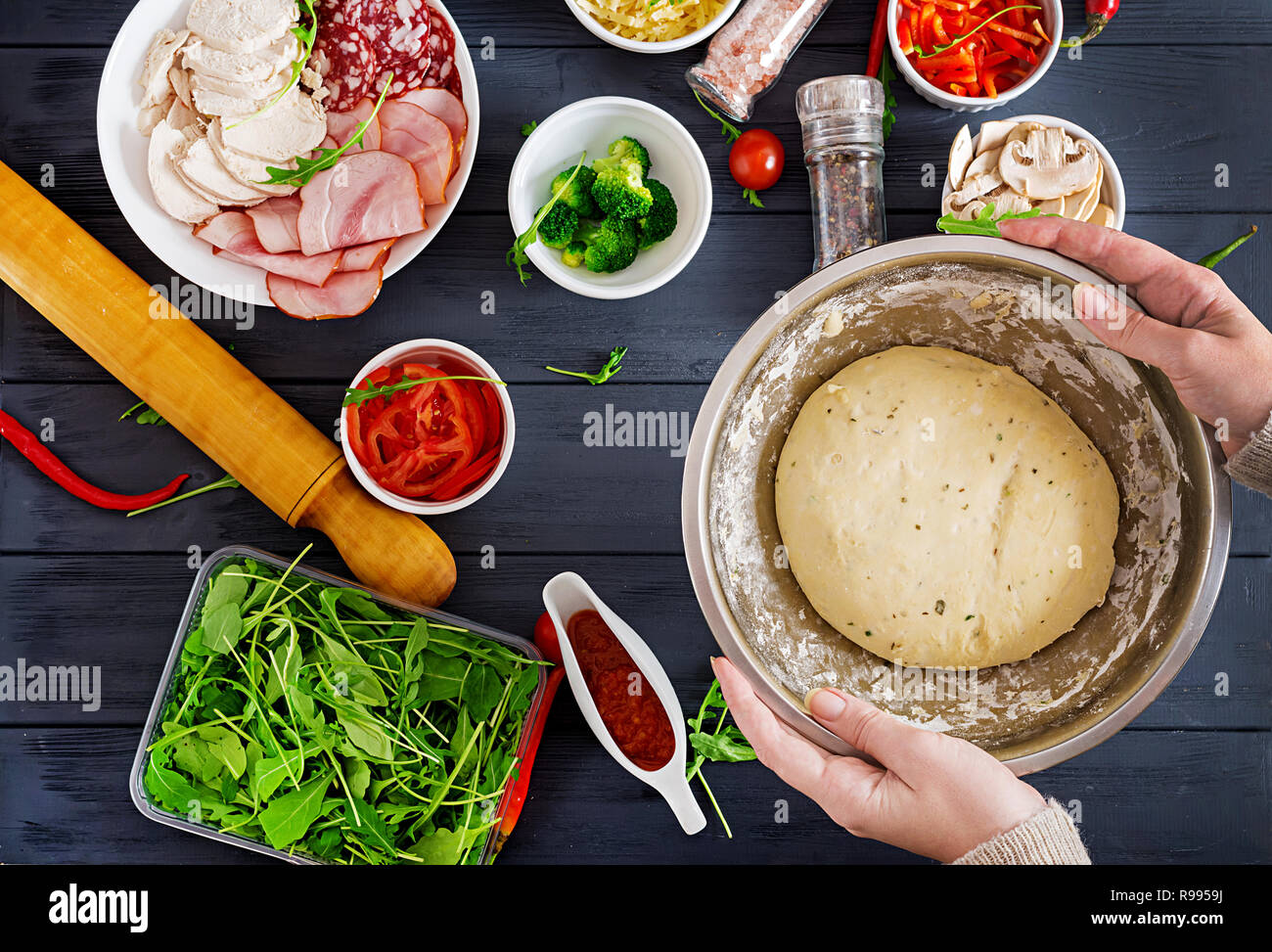 Italian pizza. Hands working with dough preparation pizza or pie making ...