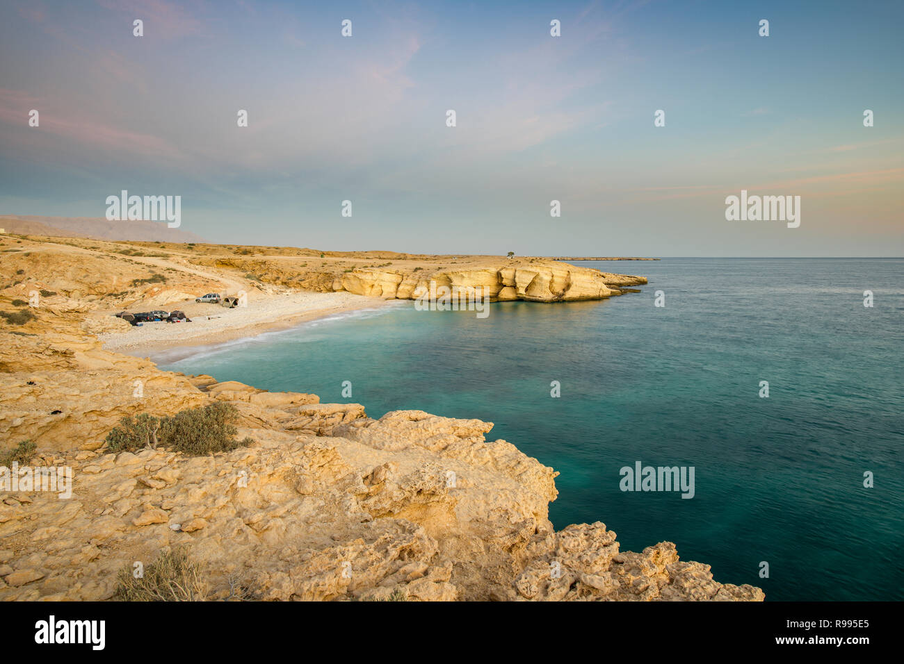 Poeple camping on a beach in the wild coast of the Sultanate of Oman ...