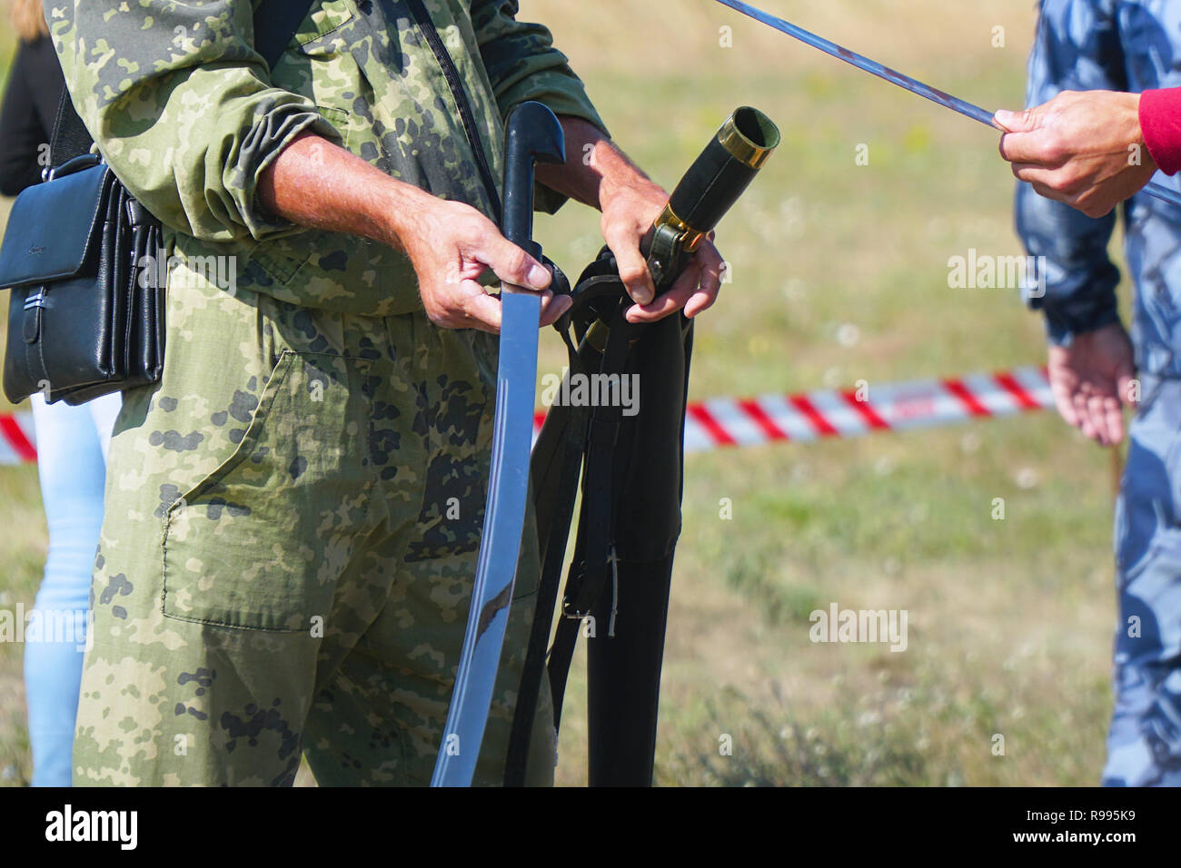 Cavalry sword in the hands of soldier Stock Photo - Alamy