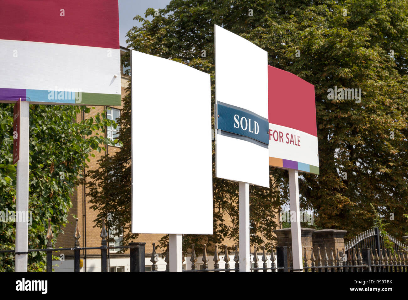 Blank for sale signs on display Stock Photo - Alamy