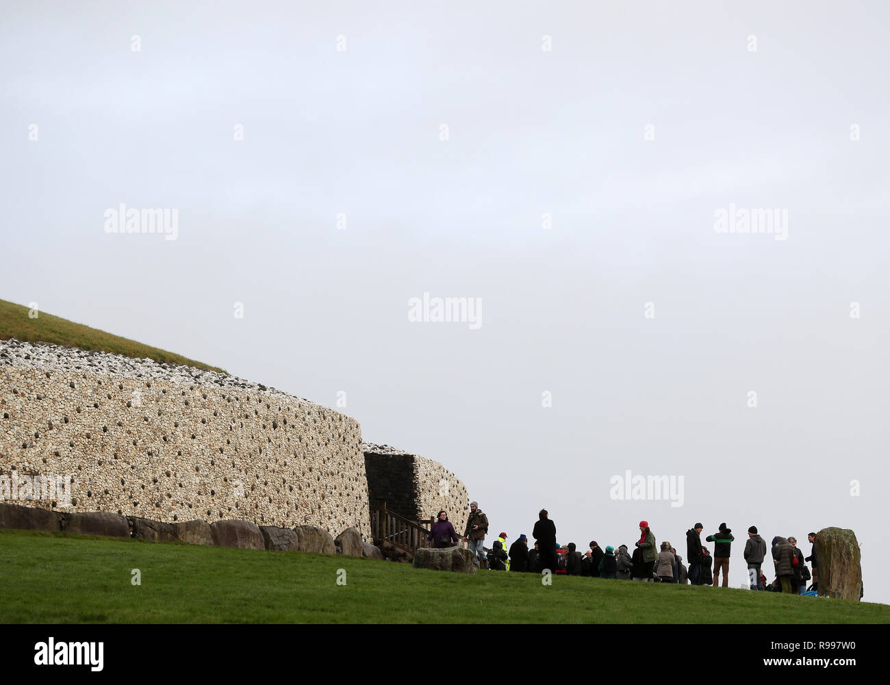 People gather for sunrise at Newgrange on the morning of the winter ...