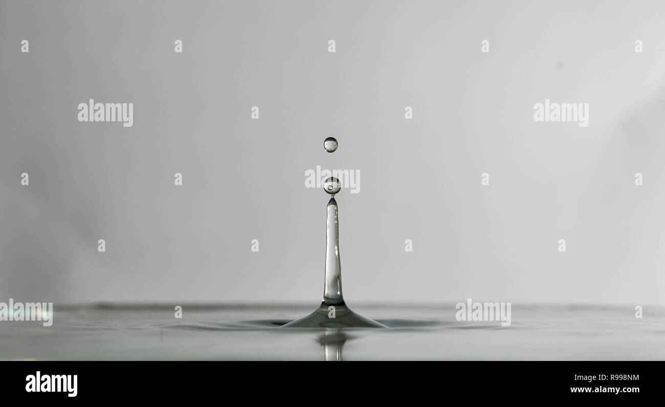 Droplets Hitting Water Surface Stock Photo - Alamy