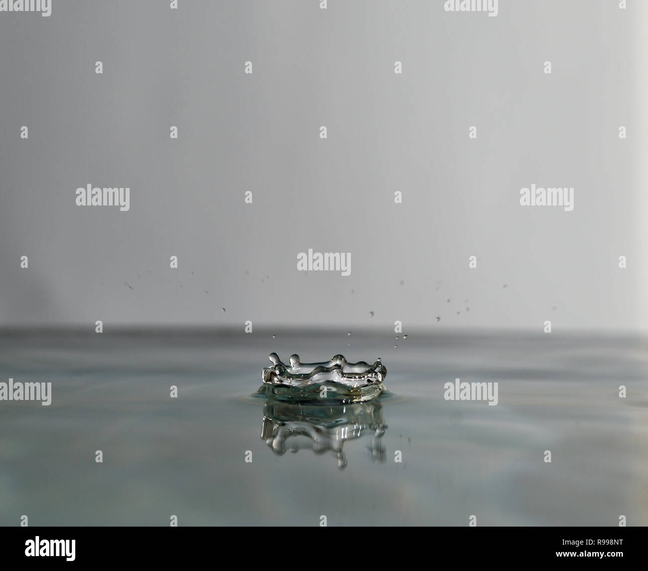Droplets Hitting Water Surface Stock Photo - Alamy