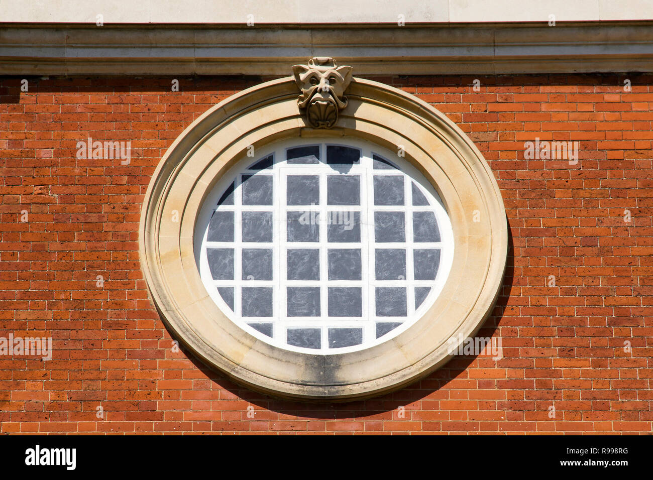 LONDON, UK - May 11, 2018. Round window at Hampton Court Palace which ...