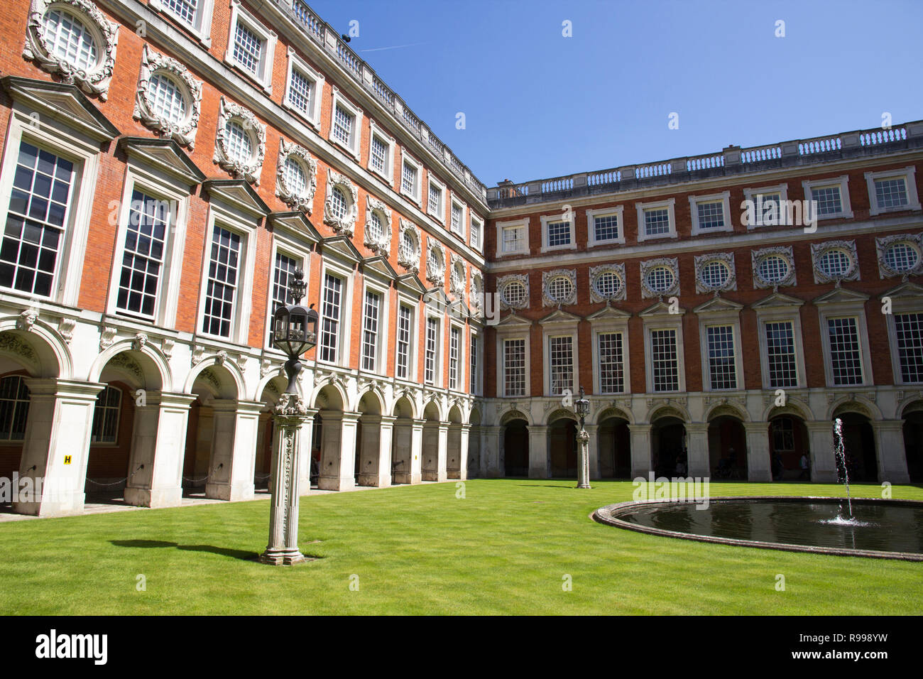 LONDON, UK - May 11, 2018. Courtyard at Hampton Court Palace which was ...