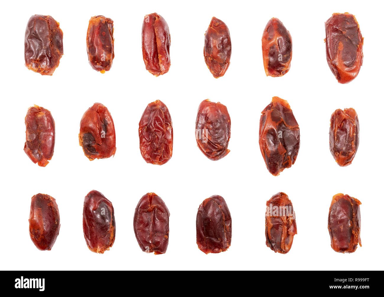 Dried dates isolated on white background Stock Photo - Alamy