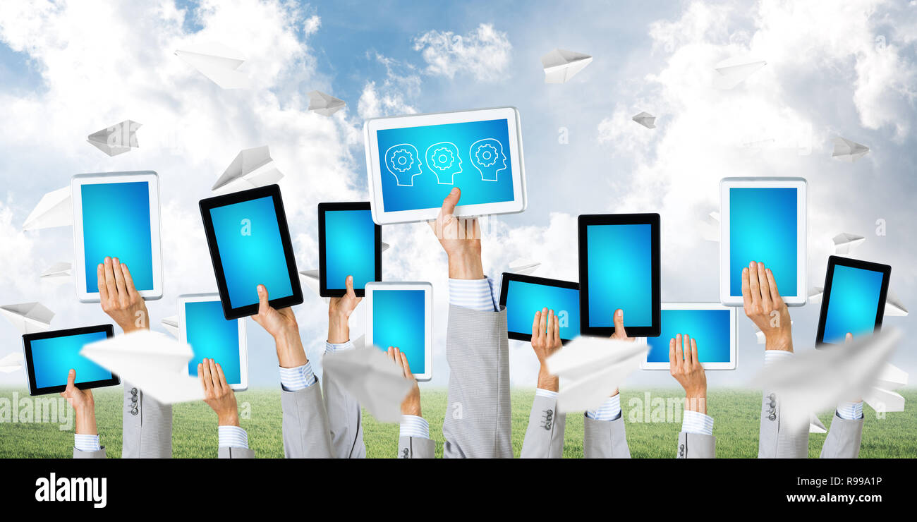 Close of businessman hands in line showing tablet pc with blank blue ...