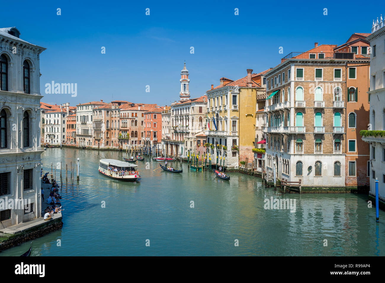 Traditional view of Venice channels - popular touristic attraction of ...
