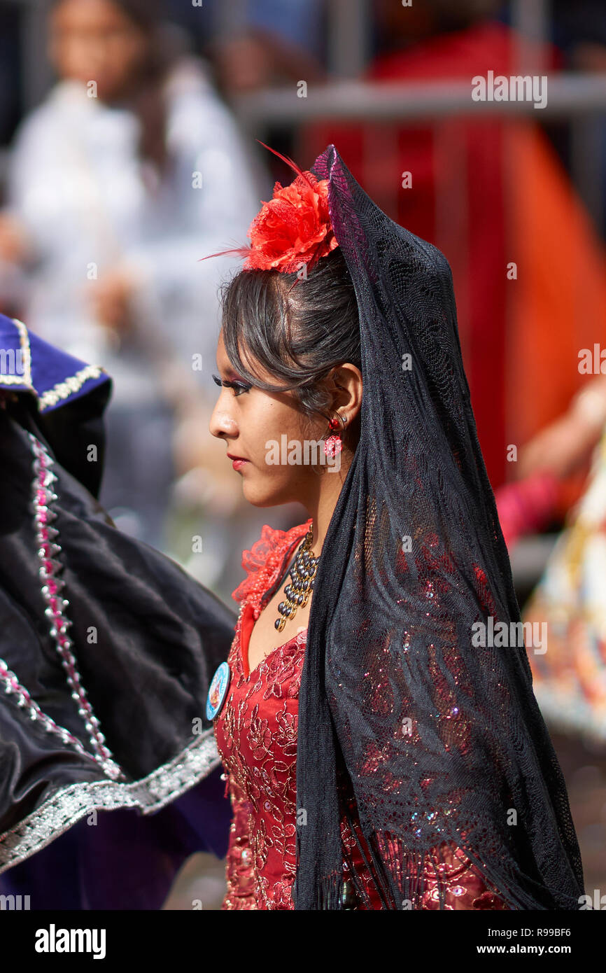 Members of a Waca Waca dance group in ornate costume parade through the ...
