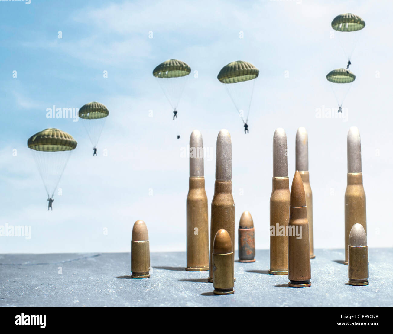 Parachutists jump from a military plane during a military exercise ...