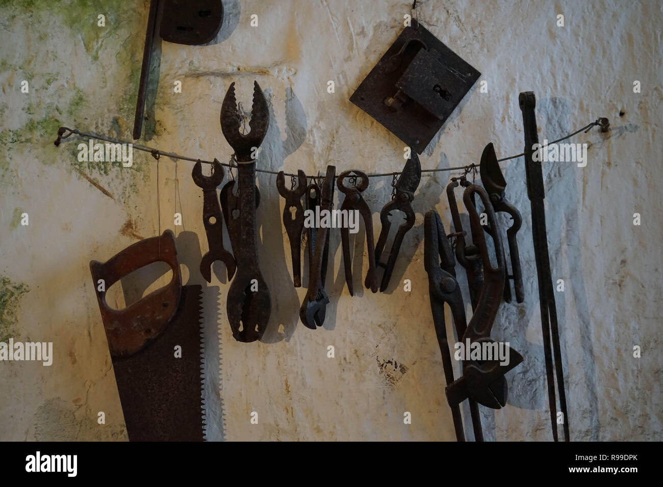 Old tools working in a cave house in Matera Stock Photo - Alamy