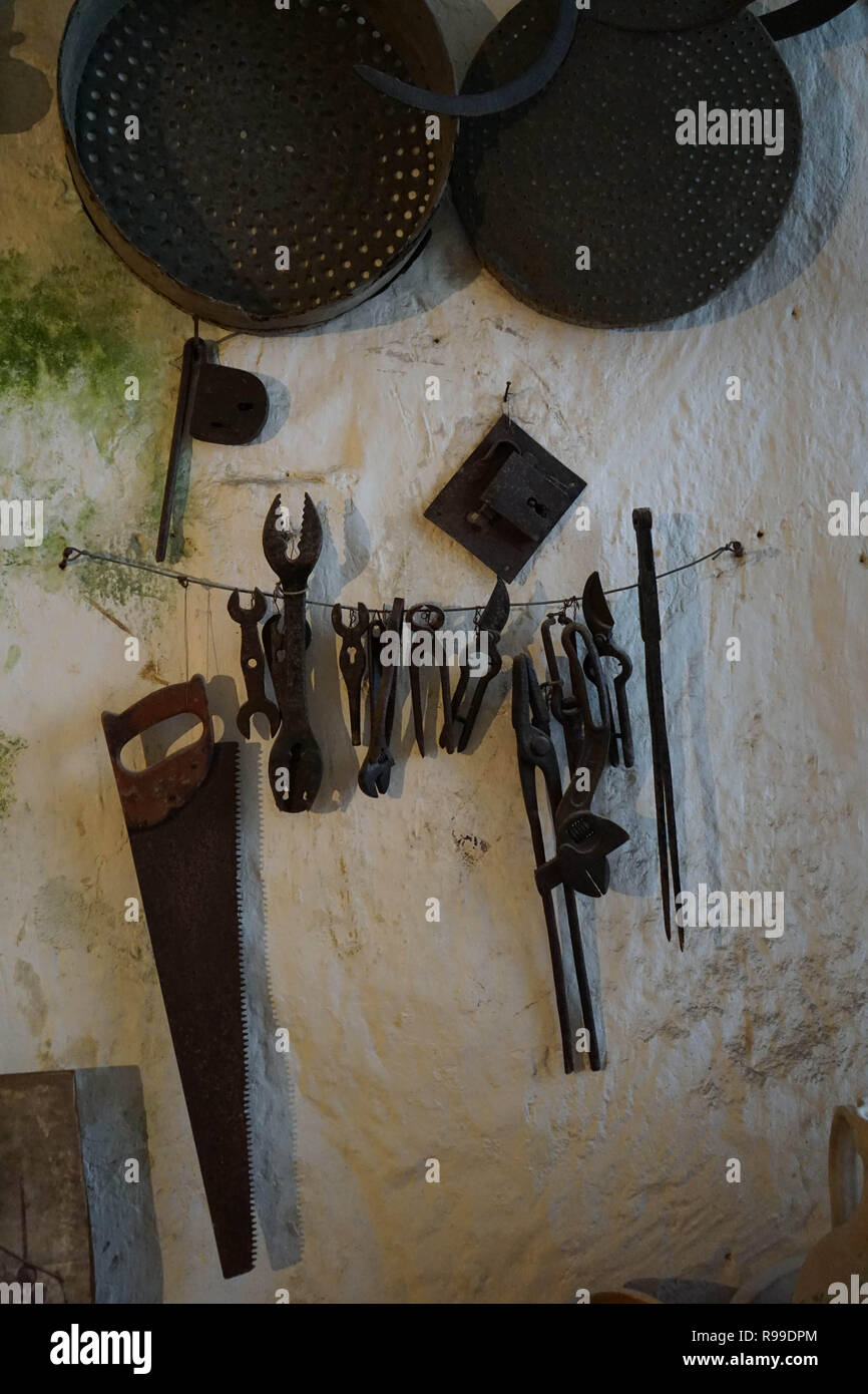 Old tools working in a cave house in Matera Stock Photo - Alamy