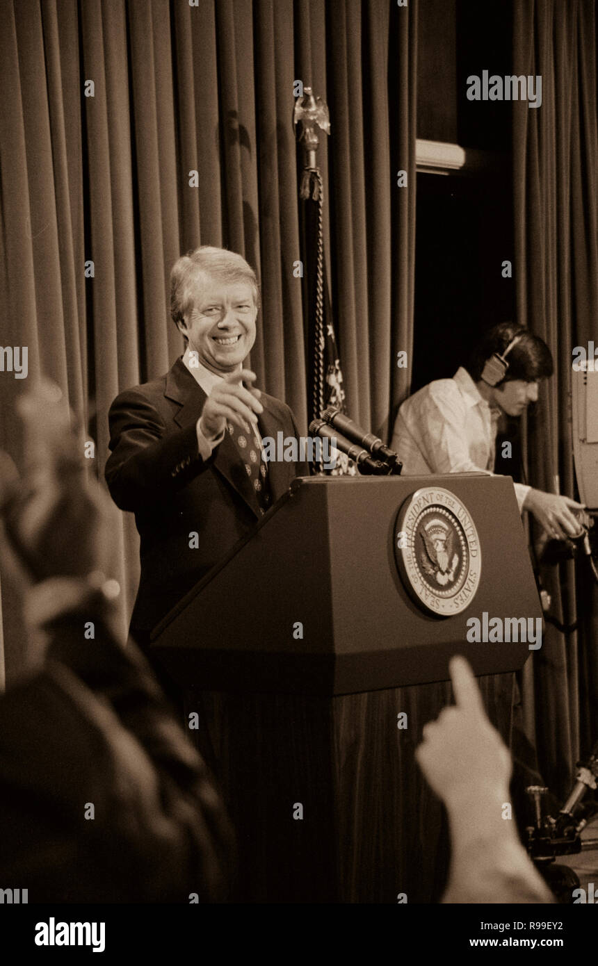 President Jimmy Carter at a press conference, taking a question. 1977 ...
