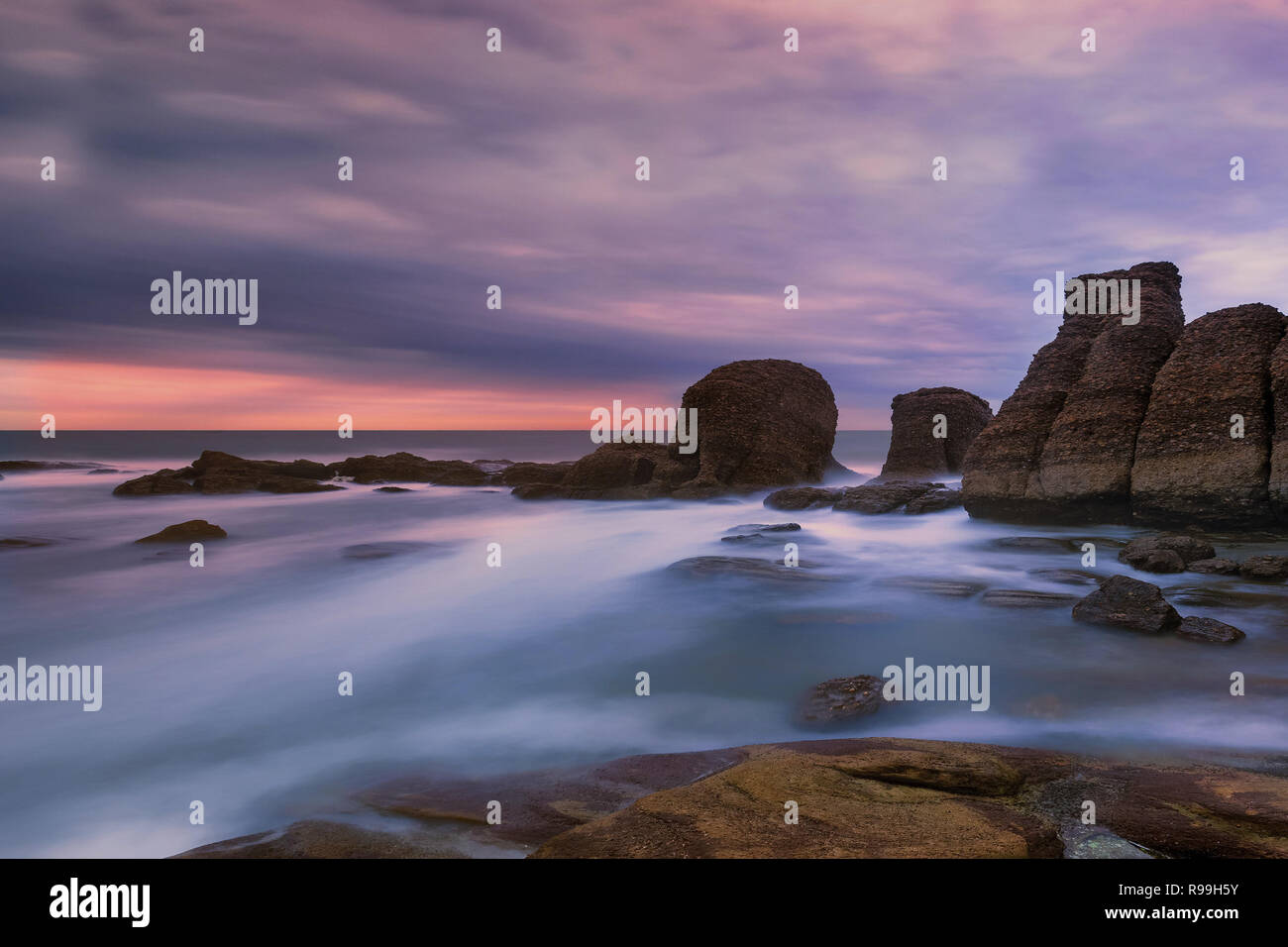 Dangerous stone at sea Stock Photo - Alamy