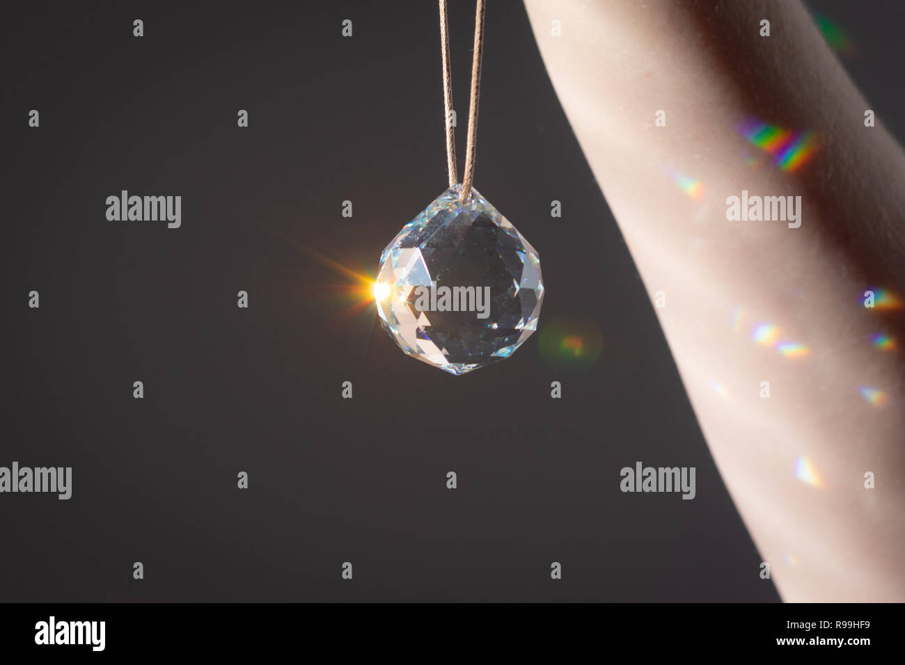 Light refracted through faceted crystal sphere Stock Photo - Alamy