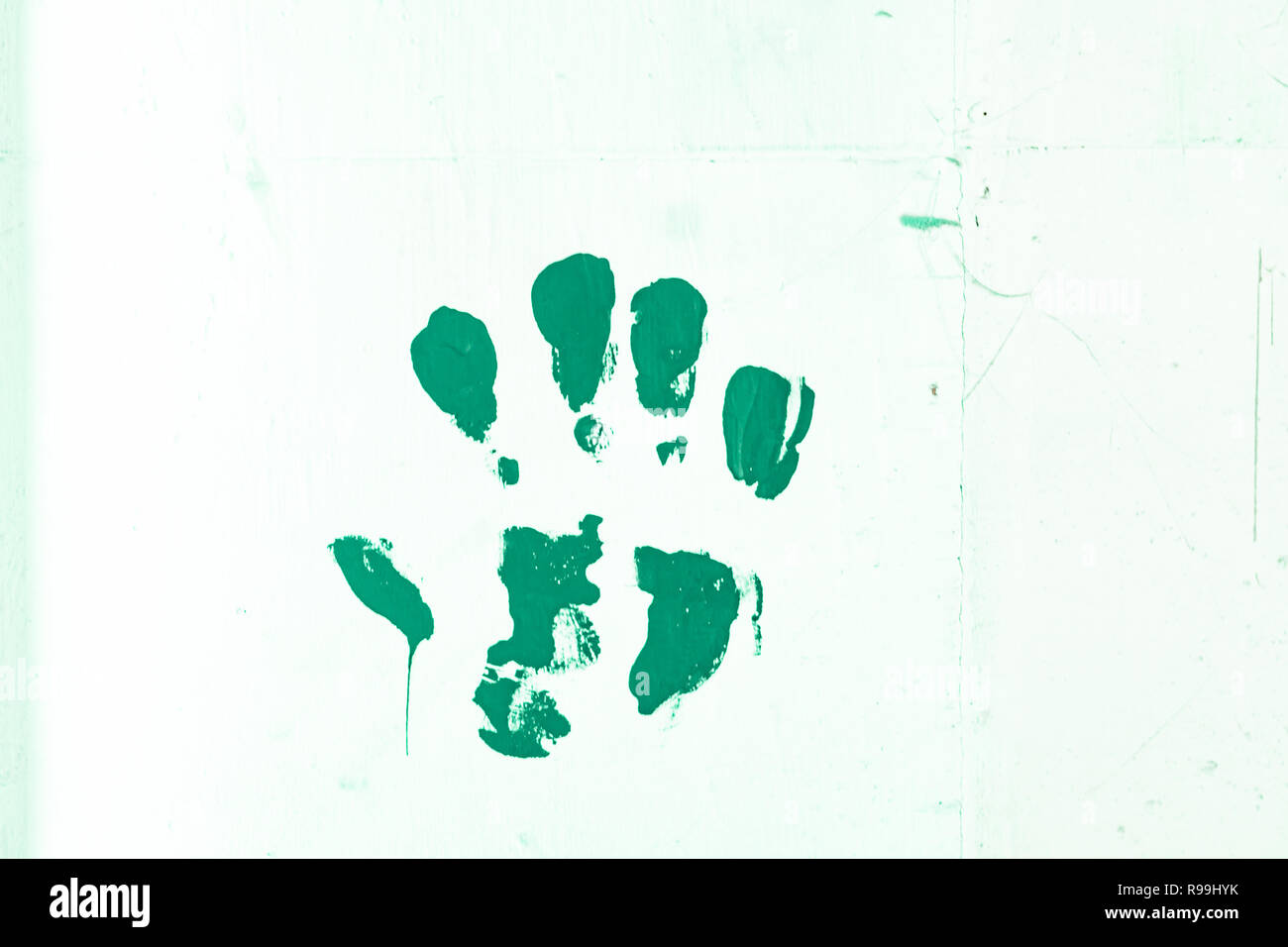 handprint in paint on white wall Stock Photo - Alamy