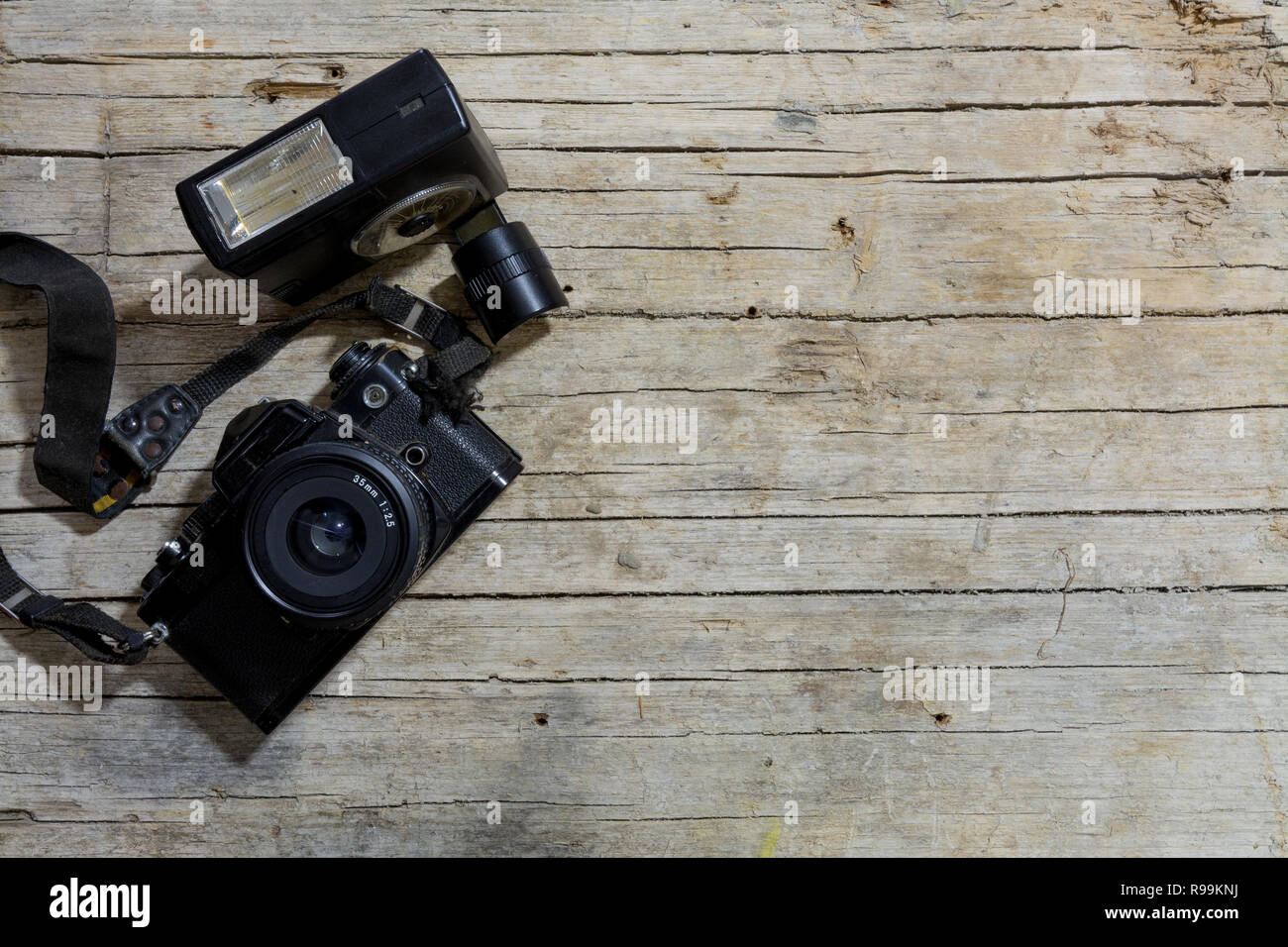 Vintage film camera on wooden table. Top view with copy space Stock ...