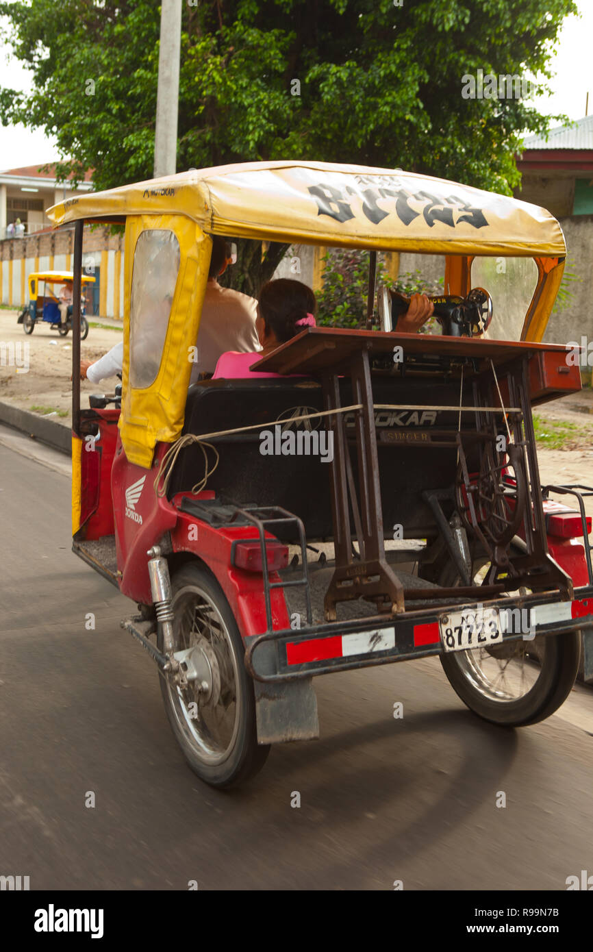 Tricycle taxi at Iquitos,Peru Stock Photo - Alamy