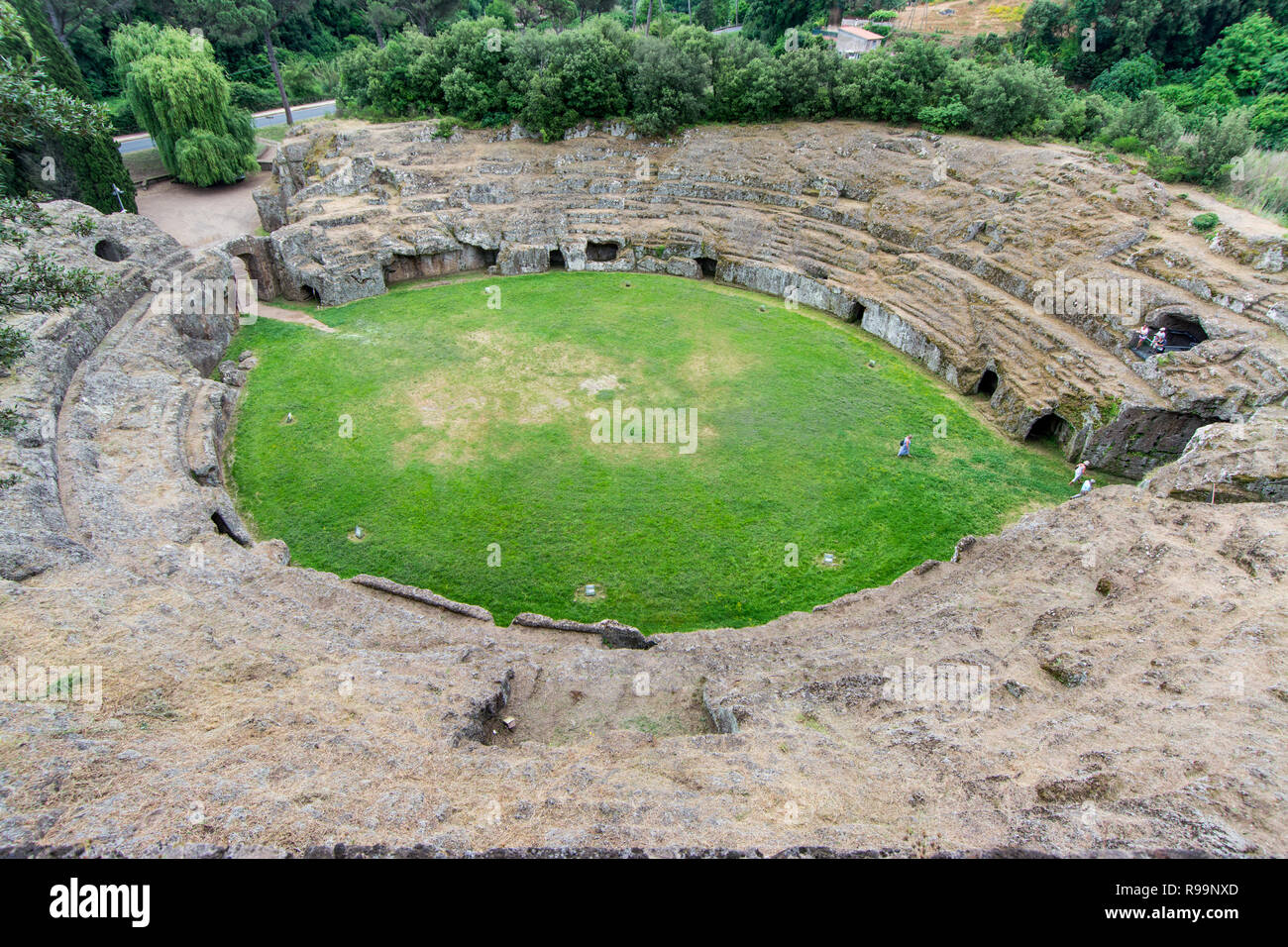 Sutri in Lazio, Italy. The rock-hewn amphitheatre of the Roman period ...