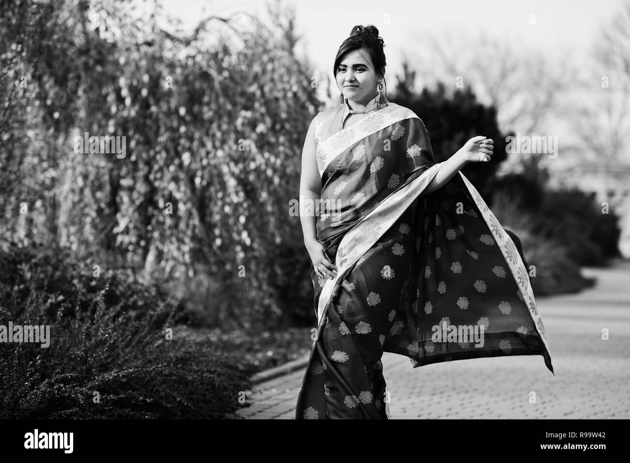 Indian girl walking Black and White Stock Photos & Images - Alamy