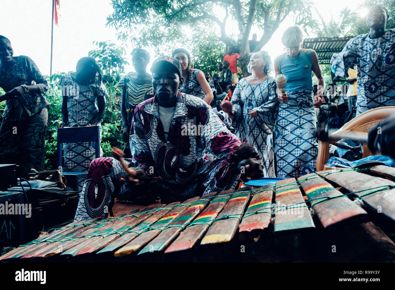 Black man playing xylophone. Multi Ethnic music party to celebrate ...