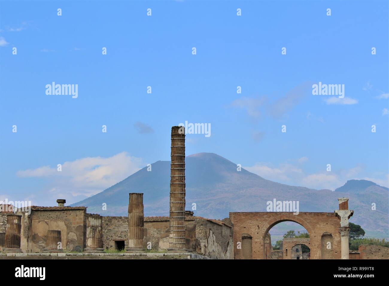 Ruins of the ancient Roman city of Pompeii, Italy, with the Mount ...