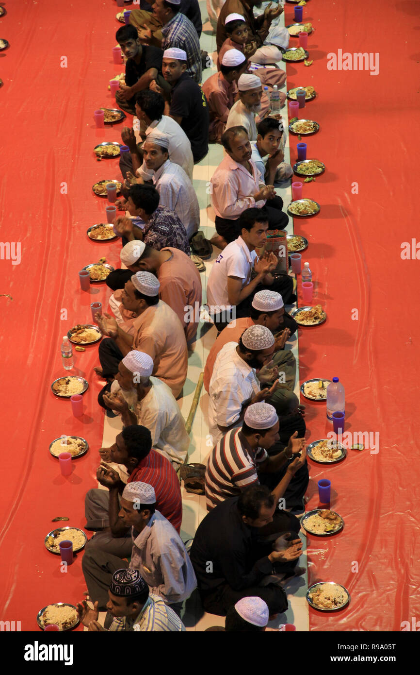Devotees at a mass-iftar gathering at Baitul Mukarram National Mosque ...